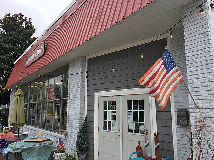 The unassuming exterior of Downtown Alley belies the wonderland within. That American flag isn't just decoration&mdash;it's a warning that you're about to experience peak Americana.
