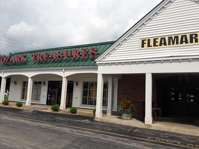 The stately exterior with its distinctive green roof announces "FLEAMARKET" like a siren song to treasure hunters everywhere.