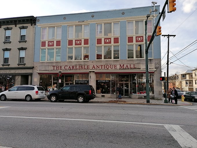 The iconic blue facade of The Carlisle Antique Mall stands like a beacon for treasure hunters on North Hanover Street.