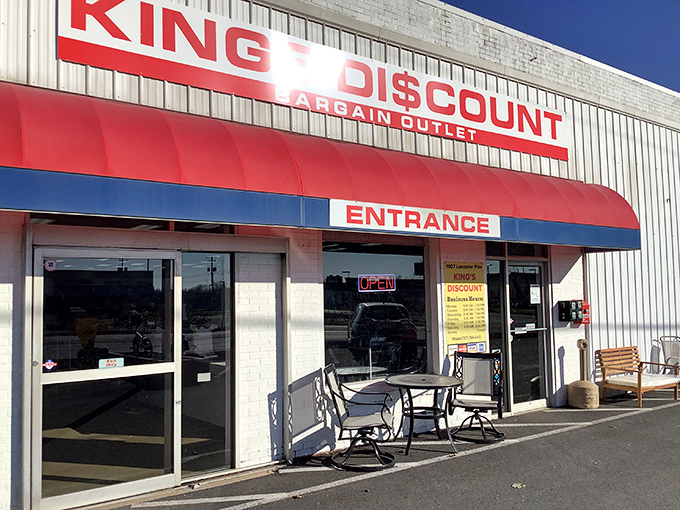 The classic red awning and bold signage announce your arrival at bargain paradise. No fancy frills needed when the deals inside speak volumes.