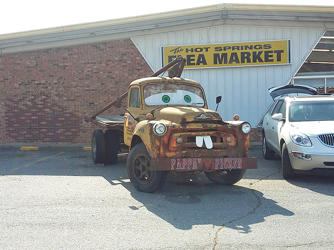 Mater's long-lost Arkansas cousin greets visitors outside the Hot Springs Flea Market, proving that even tow trucks deserve a second act in showbiz.