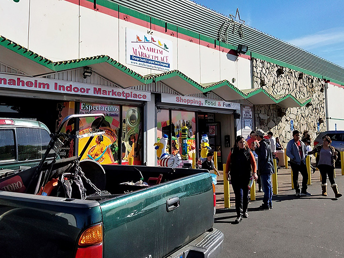 The unassuming exterior belies the treasure trove within. Like finding a secret portal to another world, this entrance promises adventure beyond the parking lot.