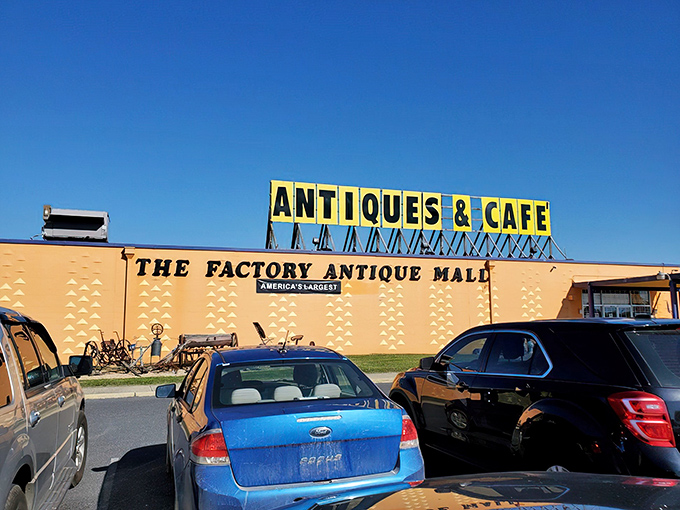 The sunshine-yellow exterior of Factory Antique Mall beckons like a beacon to treasure hunters.