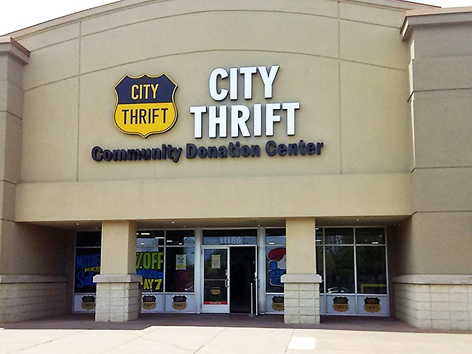 The beige fortress of bargain hunting beckons with its shield-like logo—your first clue that treasure awaits inside this Overland Park institution.