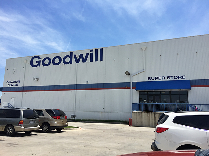 The unassuming exterior hides a treasure hunter's paradise inside. Like finding a secret portal to bargain heaven, this warehouse beckons with untold possibilities.