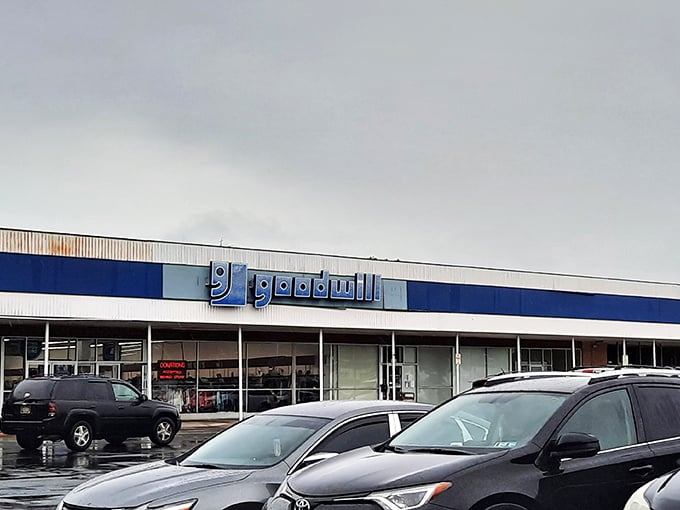 The blue-and-white facade of Dover's Goodwill beckons like a siren song to treasure hunters. What wonders await behind those sliding doors?
