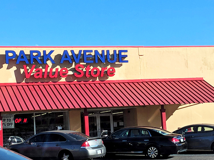 The unassuming exterior of Park Avenue Value Store in Southaven &ndash; where treasure hunting adventures begin beneath that iconic red awning.