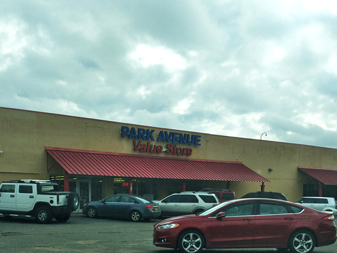 The unassuming exterior of Park Avenue Value Store in Southaven &ndash; where treasure hunting adventures begin beneath that iconic red awning.