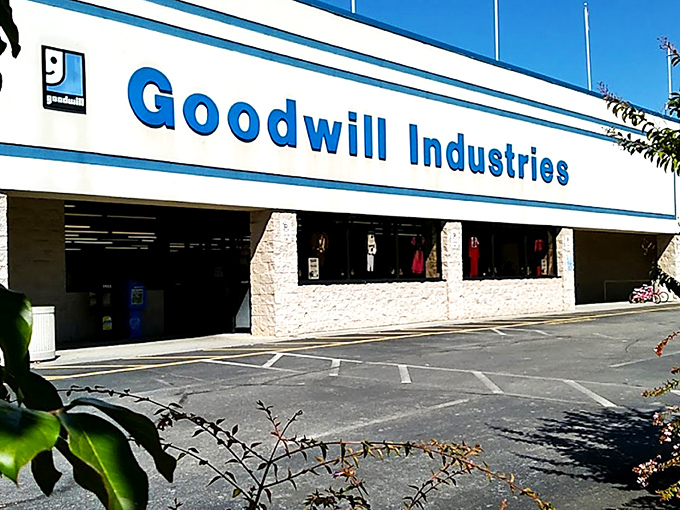 The iconic blue and white facade of Goodwill Industries on Kingston Pike stands like a beacon for treasure hunters across Knoxville, promising adventures in secondhand splendor.