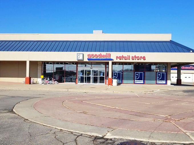 The blue-roofed treasure chest of Madison awaits! Goodwill Nakoma stands like a retail fortress where bargain hunters begin their day-long quests.