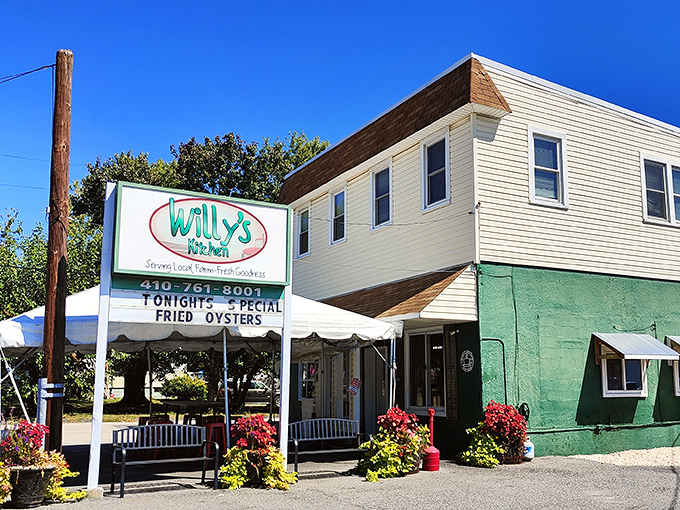 The mint-green exterior of Willy's Kitchen stands like a time capsule in Glen Burnie, promising comfort food treasures within. Tonight's special: fried oysters!