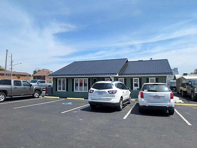 The unassuming exterior of Moey's Diner proves once again that culinary treasures often hide in plain sight. This little green building holds breakfast magic inside.