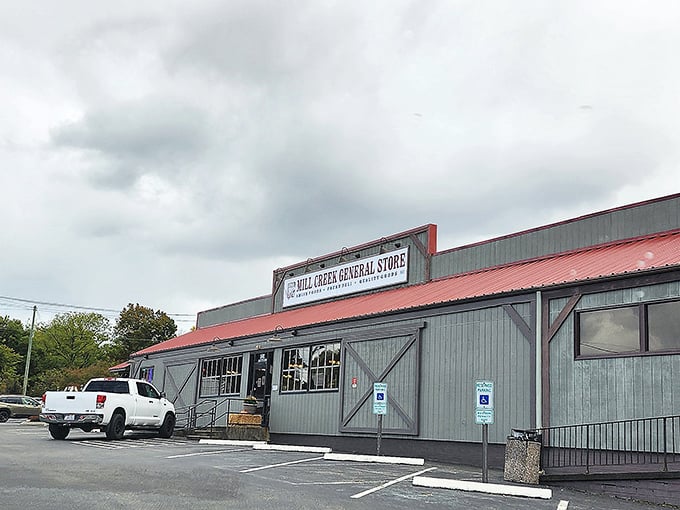 The unassuming exterior of Mill Creek General Store &ndash; where culinary treasures hide behind a humble fa&ccedil;ade that wouldn't look out of place in a Norman Rockwell painting.