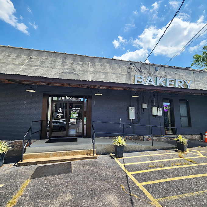 The unassuming exterior of Ambrosia Bakery proves that culinary greatness often hides behind modest facades, like finding Narnia in an ordinary wardrobe. 