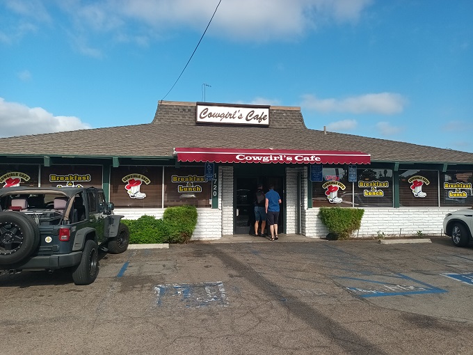 Welcome to flavor town! Cowgirls Cafe's unassuming exterior hides a treasure trove of comfort food that'll make your taste buds do the two-step. 