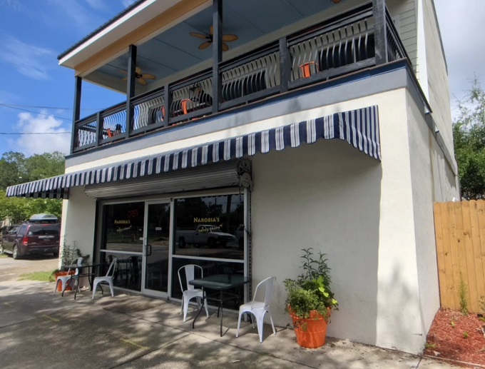 A Southern charmer in white, Narobia's stands proud with its striped awning. It's like the restaurant equivalent of a warm hug from your favorite aunt.