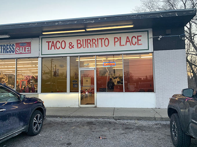 The architectural equivalent of "I'm here for the food, not the frills." Taco & Burrito Place announces its straightforward mission with no-nonsense signage.
