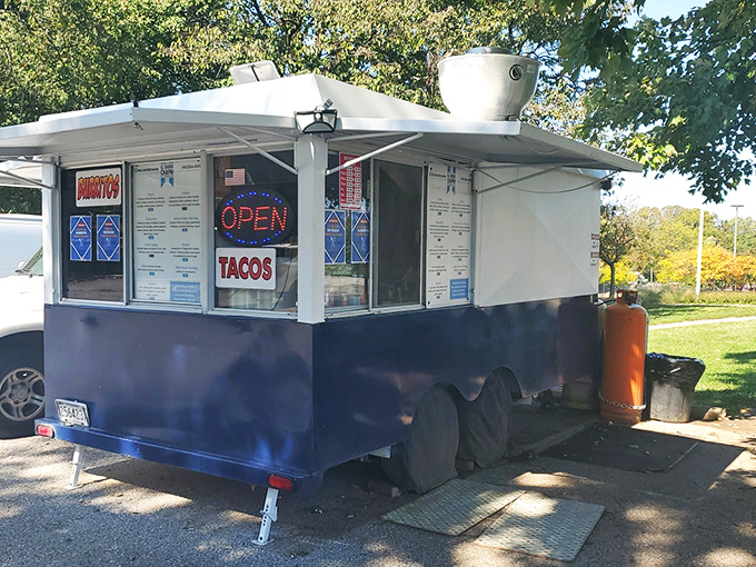 The unassuming blue and white trailer of El Sabor Chapin sits like a culinary treasure chest in Columbia, promising authentic Guatemalan flavors to those in the know.