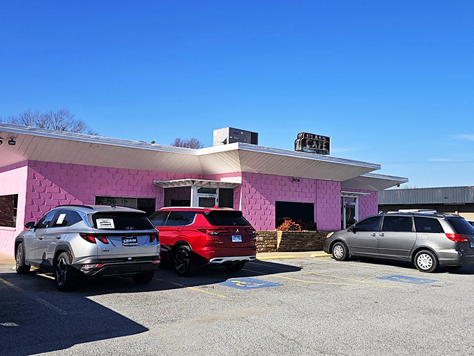 The pink palace of poultry stands proudly against the Arkansas sky, like a delicious mirage beckoning hungry travelers from miles around.