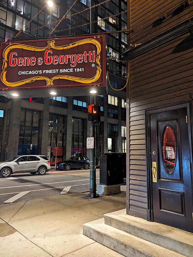 The iconic red and gold sign beckons like a lighthouse for steak lovers. Chicago's culinary history hangs right there on Franklin Street.