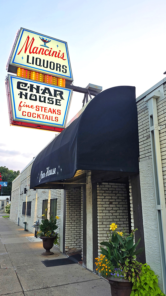 That vintage neon sign isn't just advertising &ndash; it's a time machine promising cocktails, steaks, and an evening where calories don't count.