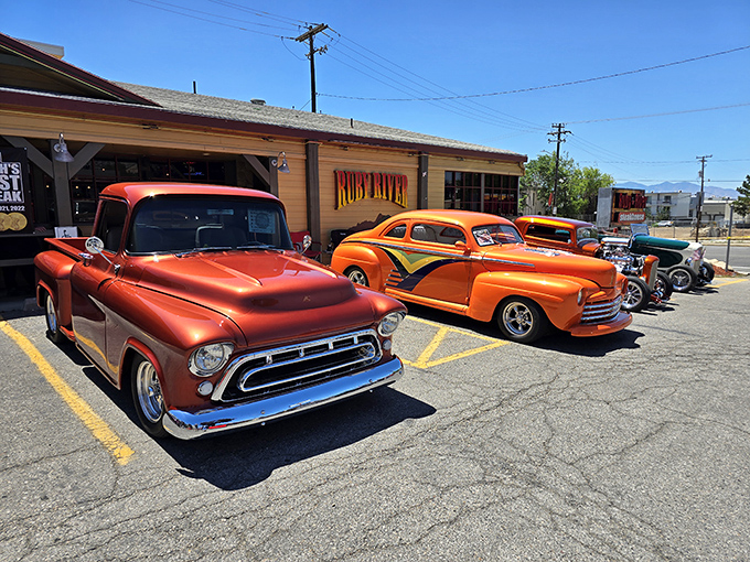 Classic hot rods line up outside Ruby River like a time capsule of American automotive glory. The perfect prelude to the meat-centric feast awaiting inside.