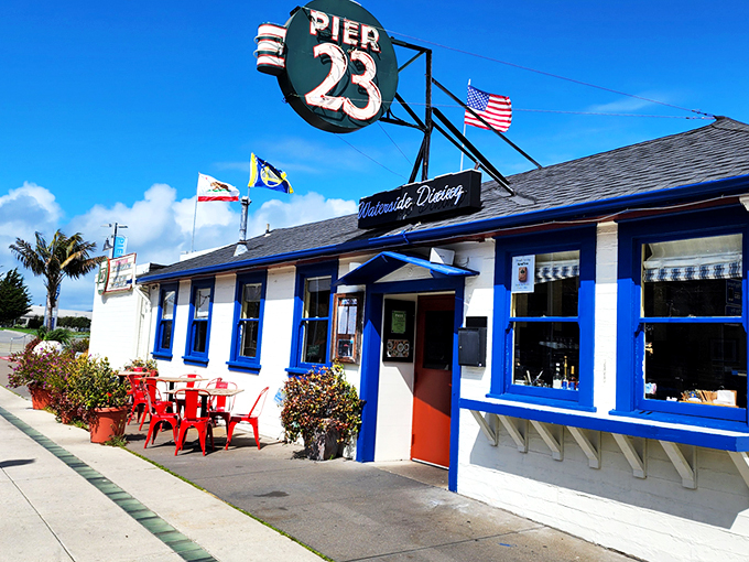 The iconic "23" sign beckons like a lighthouse for hungry souls navigating San Francisco's Embarcadero. Blue trim, waterfront charm, and promises of seafood paradise await.