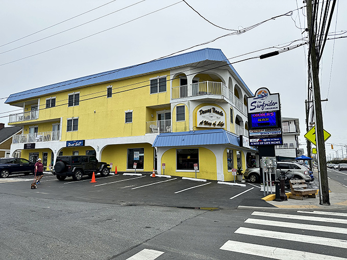 The unassuming blue-trimmed exterior of Woody's stands like a beacon of culinary promise amid Dewey Beach's laid-back coastal charm.