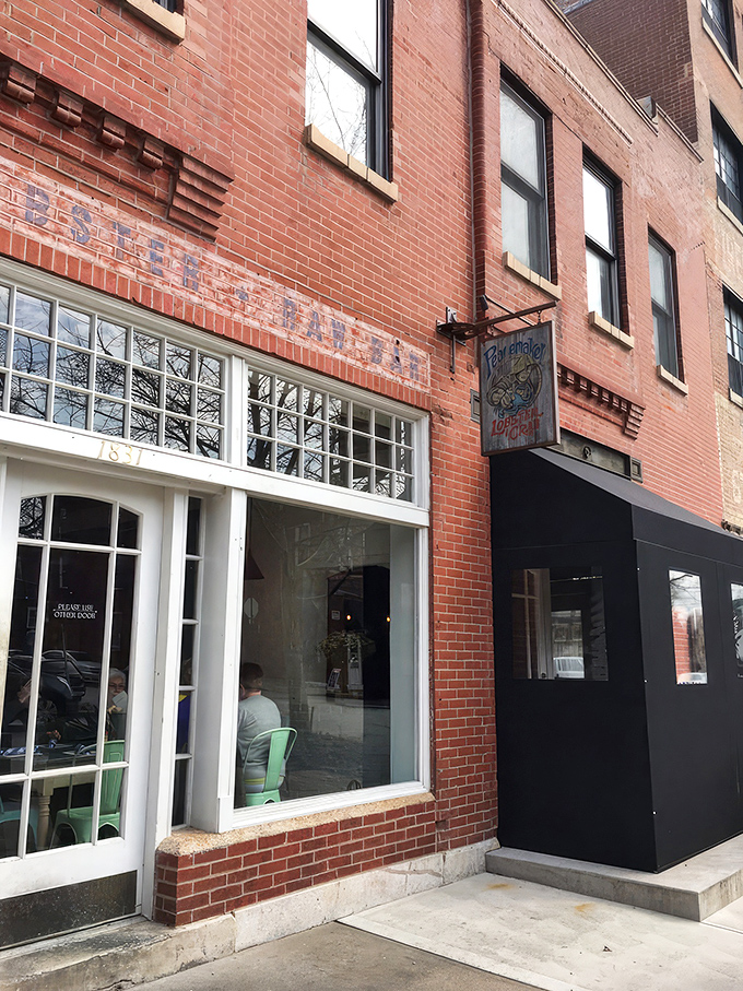 The welcoming brick exterior of Peacemaker beckons seafood lovers like a lighthouse to ships, promising coastal delights in landlocked Missouri.