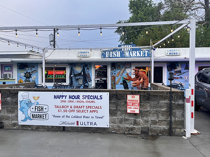 The unassuming blue exterior of The Fish Market in Liberty might fool you, but those string lights are basically saying "seafood paradise ahead!"