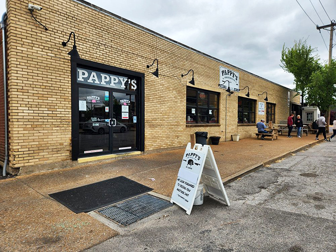 The unassuming yellow brick exterior of Pappy's Smokehouse – where BBQ pilgrims willingly make the journey for meat nirvana.