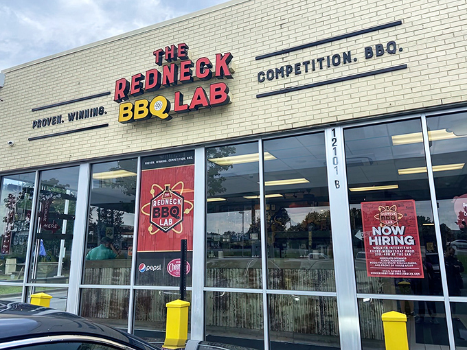 The modest storefront belies the flavor explosion waiting inside &ndash; where "Competition. BBQ." isn't just a tagline, it's a scientific promise.