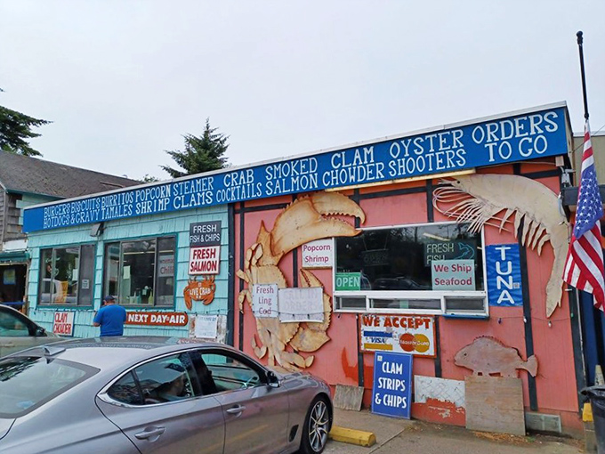 The colorful exterior beckons seafood lovers like a lighthouse calls to ships. Those vibrant picnic tables aren't just furniture&mdash;they're stages for impending seafood euphoria. 
