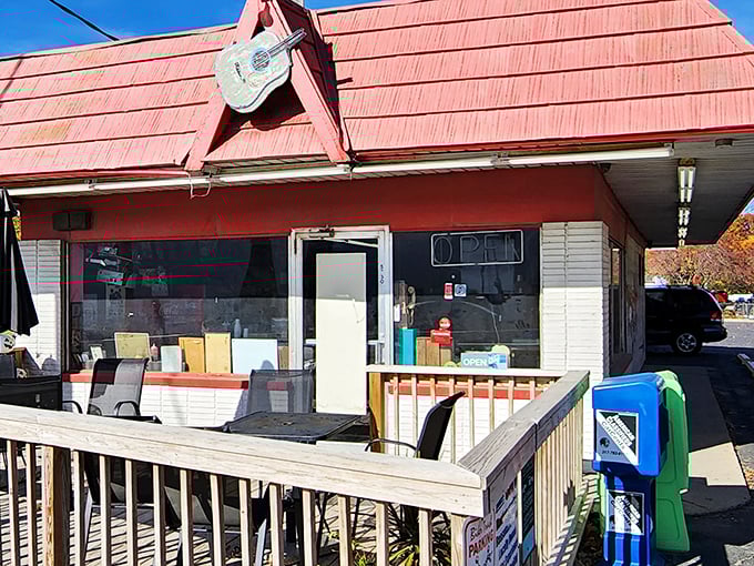 The iconic red roof of Rock-Cola 50's Cafe stands as a beacon of nostalgia along Indianapolis streets. Even the vintage sign promises good times ahead.
