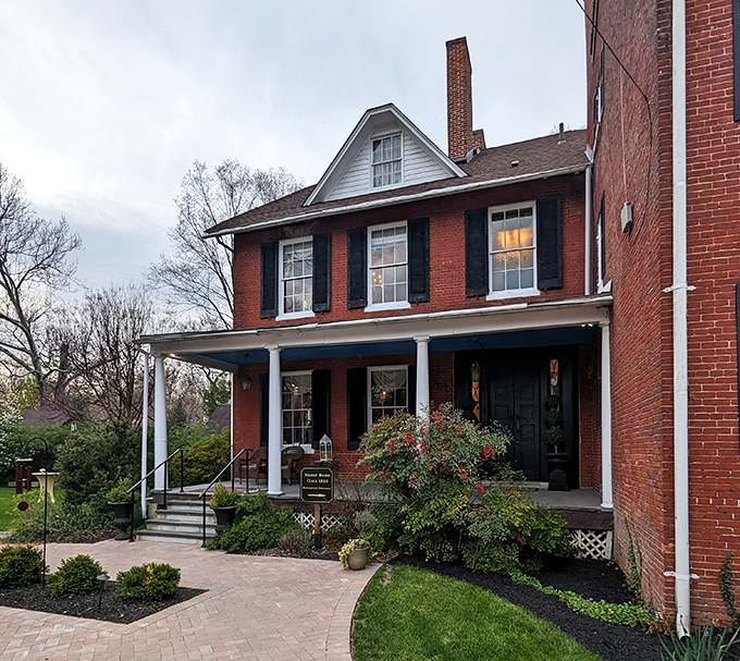 History wrapped in brick and mortar! The Elkridge Furnace Inn's stately exterior whispers stories from the 1700s while promising modern culinary delights inside.