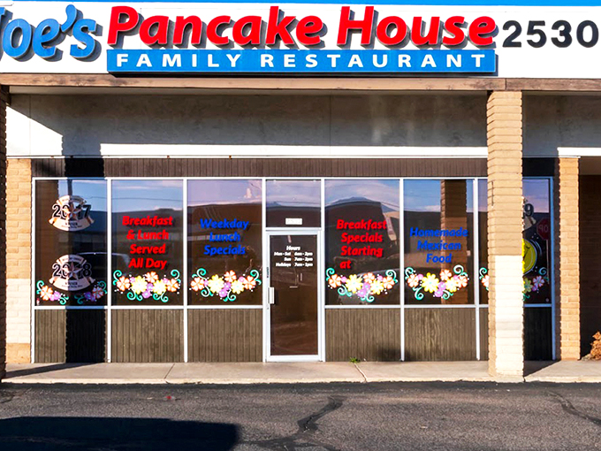 The bright blue and red sign of Joe's Pancake House stands as a beacon of breakfast hope against the clear Arizona sky.