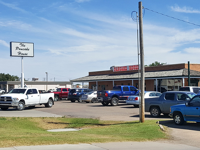 The unassuming exterior of The Pancake House in Liberal might not scream "culinary destination," but that parking lot full of locals tells the real story.