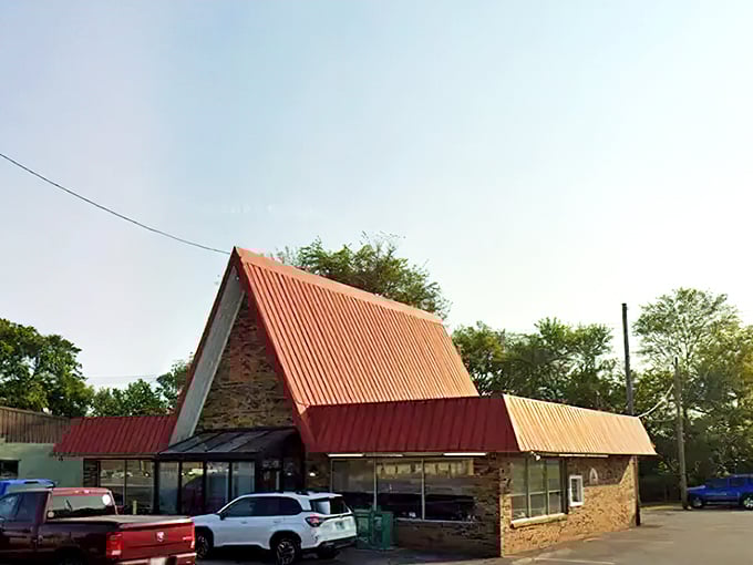 The iconic A-frame roof of G's Pancake House stands like a breakfast beacon, promising comfort food that'll make your morning infinitely better.