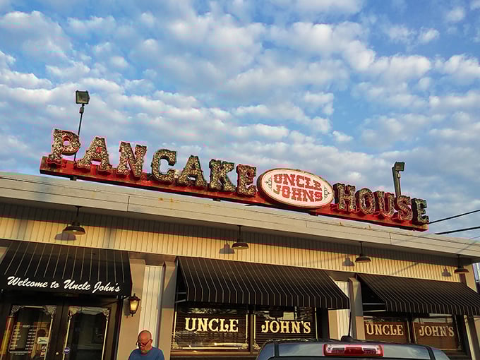 The unassuming exterior of Uncle John's Pancake House&mdash;proof that breakfast greatness often hides behind modest facades. Those black awnings have sheltered hungry Toledoans for generations.