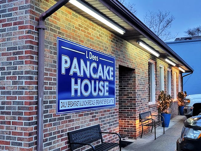 The unassuming brick exterior of L'Dees Pancake House &ndash; where breakfast dreams come true without any architectural showboating. Simple sign, serious pancakes.