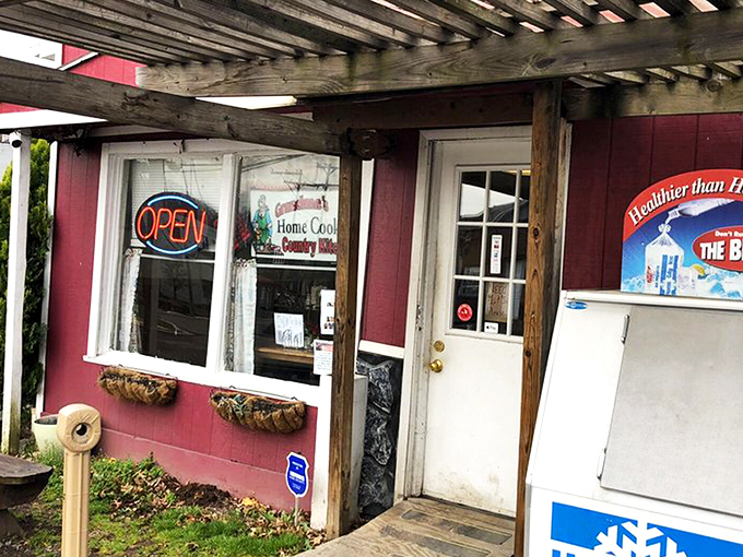 The unassuming exterior of Grandma's Country Kitchen proves once again that culinary treasures often hide in the humblest packages. That red building holds breakfast dreams. 