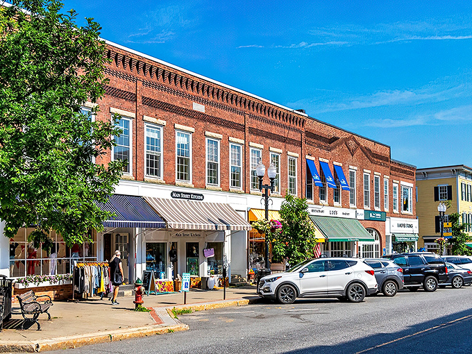 Hanover's Main Street beckons with its classic New England charm. Red brick buildings and colorful awnings create the perfect small-town backdrop for your spring adventure.