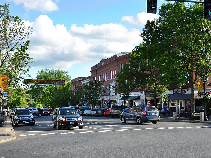 Hanover's Main Street beckons with its classic New England charm. Red brick buildings and colorful awnings create the perfect small-town backdrop for your spring adventure.