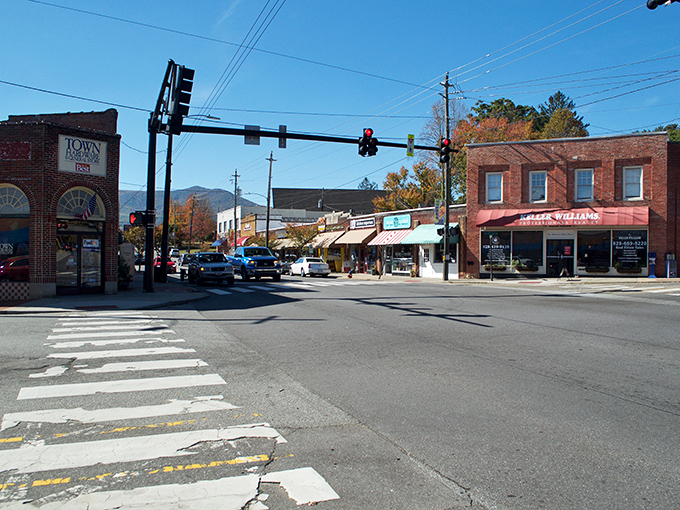 Downtown Black Mountain welcomes visitors with its classic small-town charm, where brick buildings frame picture-perfect mountain views in the distance.