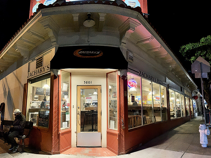 The corner storefront that launched a thousand cravings. Zachary's iconic Rockridge location glows like a beacon for pizza pilgrims after dark.