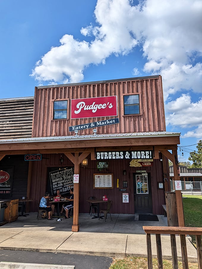 Welcome to Pudgee's, where rustic charm meets culinary delight! This unassuming exterior houses a treasure trove of flavors that'll make your taste buds do a happy dance.