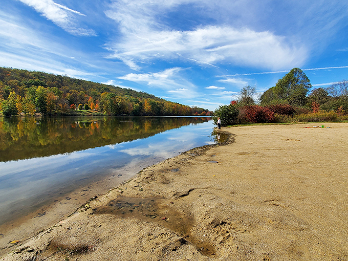 At Keystone Lake, autumn paints the shoreline while mirror-calm waters reflect Oklahoma's sky&mdash;your footprints might be the only ones today.