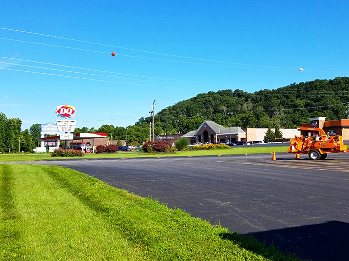 A rainbow graces the hills of Logan, nature's way of saying "stick around, the show's just getting started."  