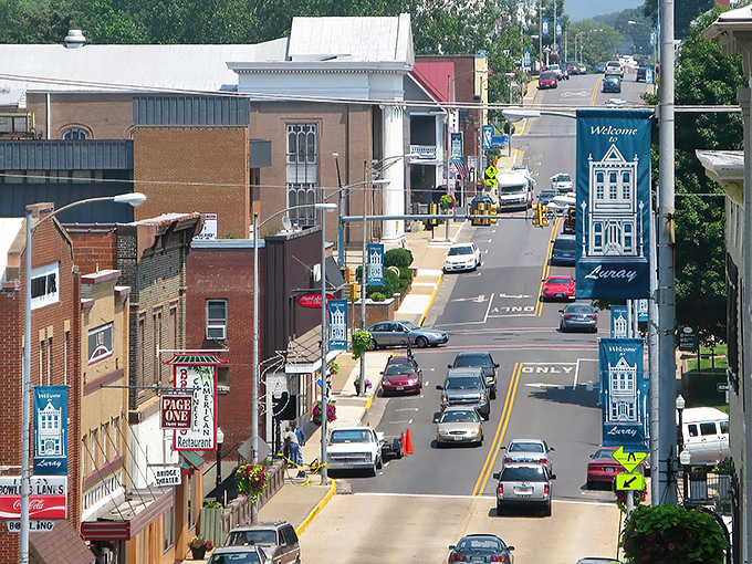 Downtown Luray greets visitors with small-town charm and big mountain views. Those Blue Ridge silhouettes in the background aren't CGI&mdash;they're your everyday spectacular reality here.