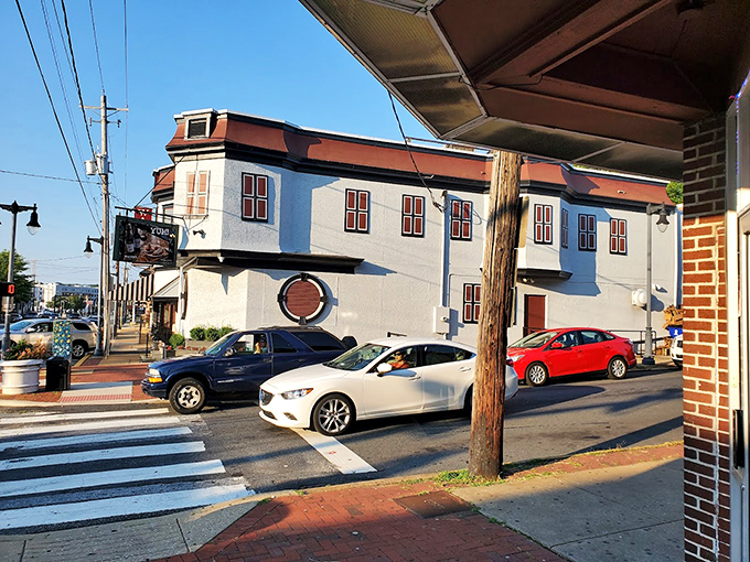 The iconic vertical WALTER'S sign beckons hungry carnivores like a meaty lighthouse guiding ships to safe harbor on Wilmington's brick-lined streets.